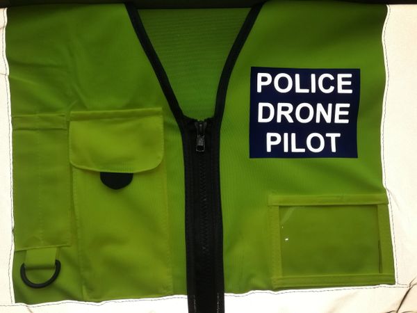POLICE DRONE PILOT, hi vis reflective tabard vest.