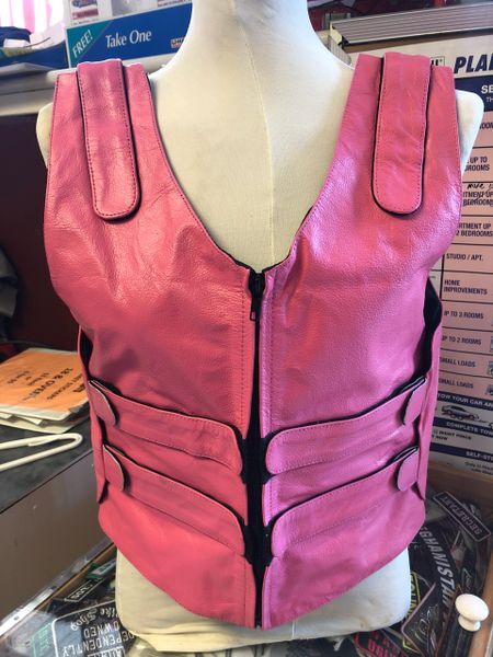 Female pink leather bullet vest