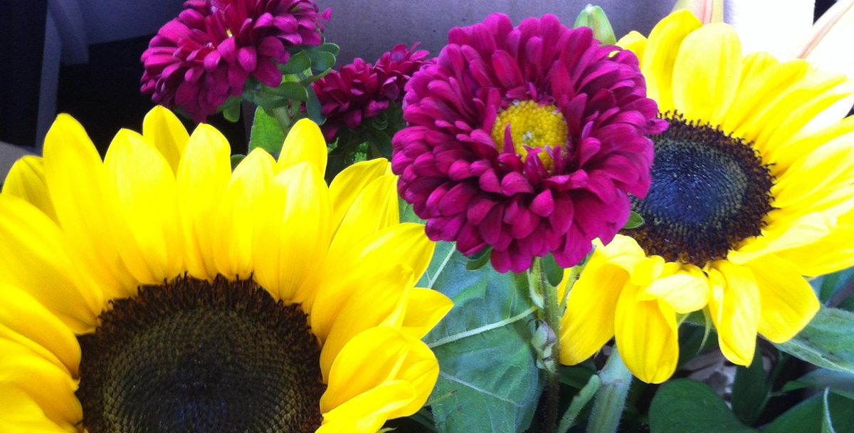 Blooming Arrangements at Outlook Design , a real florist online.