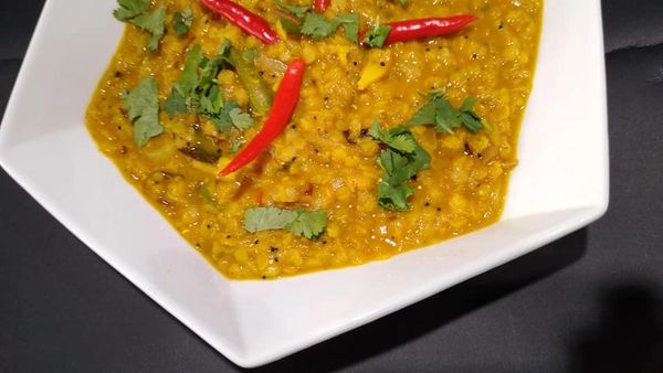 Vegan, vegetarian and gluten-free traditional lentil dal Curry using ...