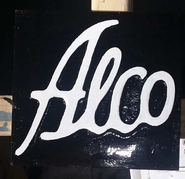 Alco Script insignia