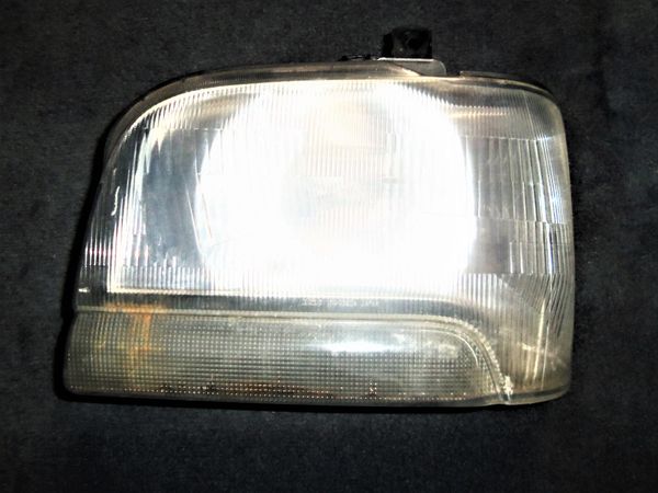 USED HEADLAMP ASSEMBLY FITS DB52T RIGHT HAND SIDE