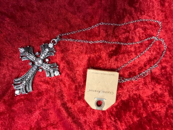 Large rocker style cross necklace