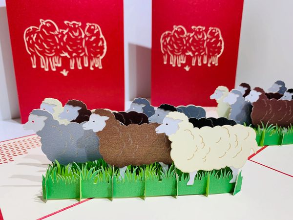 Flock of Sheep with Red Cover Pop Up Greeting Card