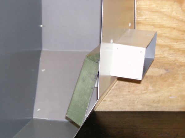 Add an Overflow Spout w/ internal baffle. Additional purchase required.