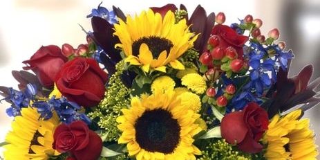 Blooming Arrangements at Outlook Design , a real florist online.